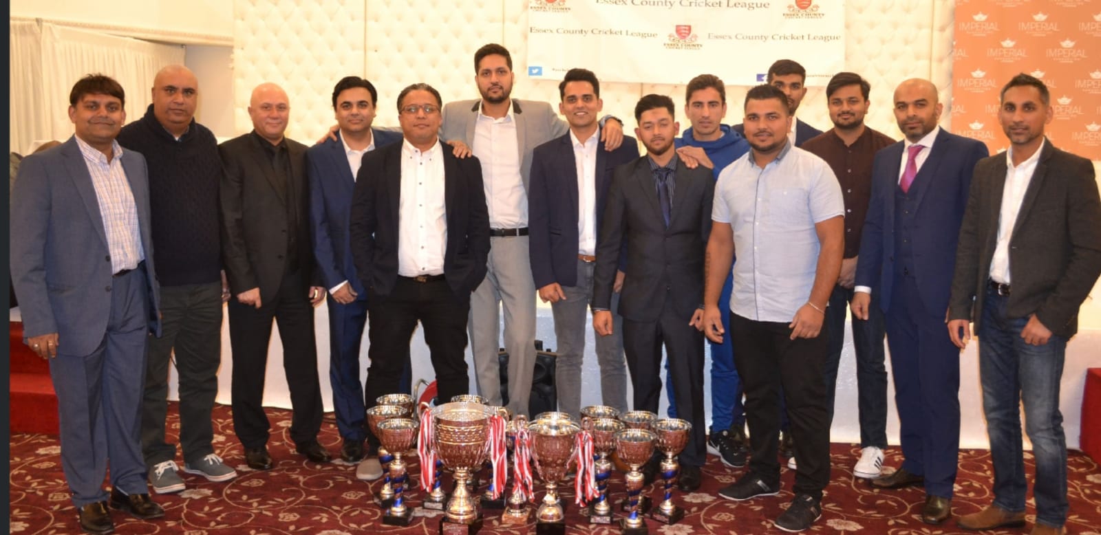 Newham lift winners trophies at ECCL Presentation evening. – Newham CC